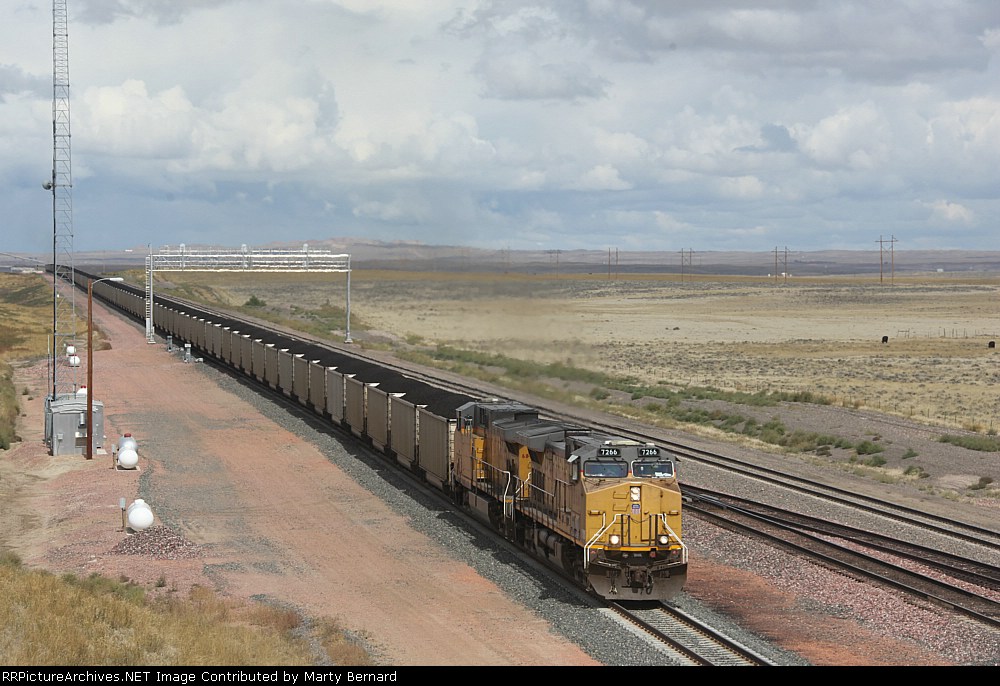 UP 7266 and 6877 With One of the Big Thunder Loading Towers in the Distance.